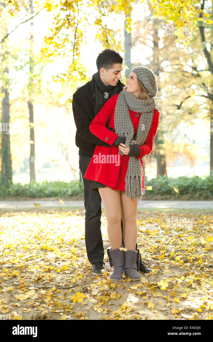 young romance couple looking each other, fashion dressed Stock Photo ...