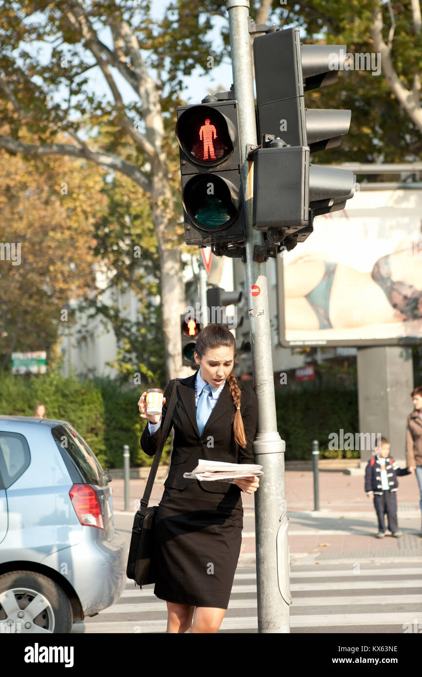 Woman at stoplight hi-res stock photography and images - Alamy