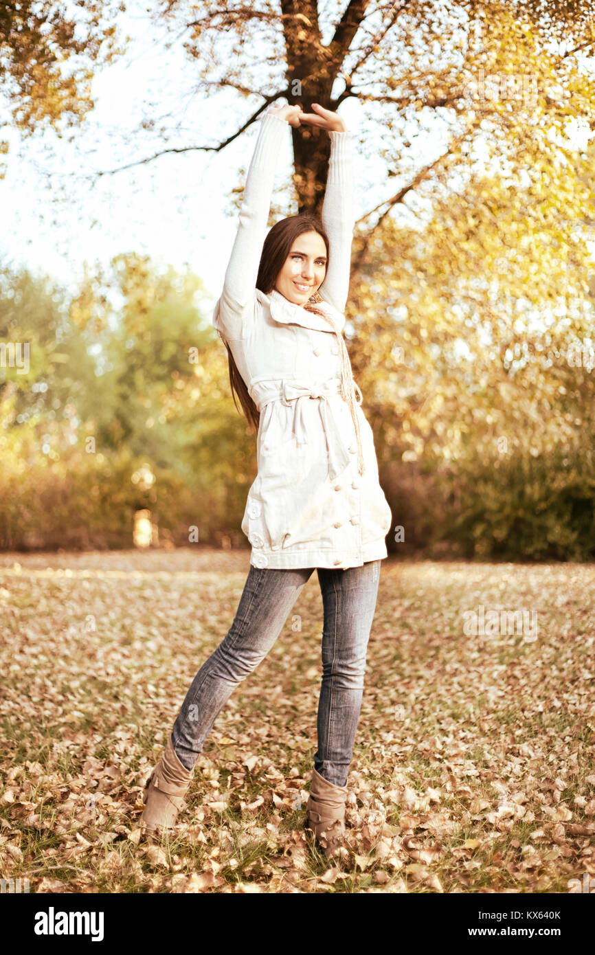 young woman in a morning walk in the park outstretching Stock Photo - Alamy