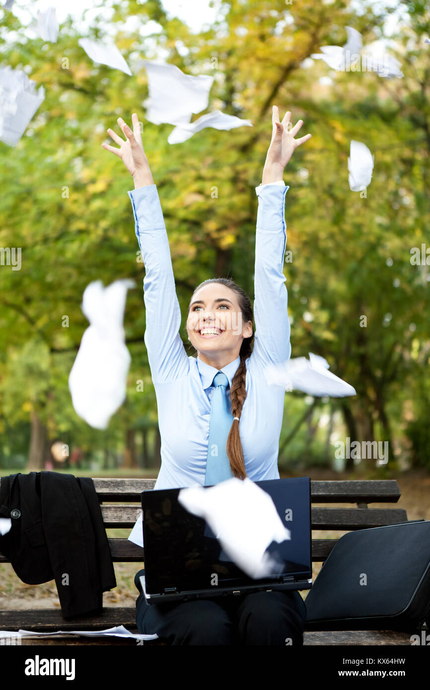 happiness businesswoman throwing paper in the air, outdoor Stock Photo ...