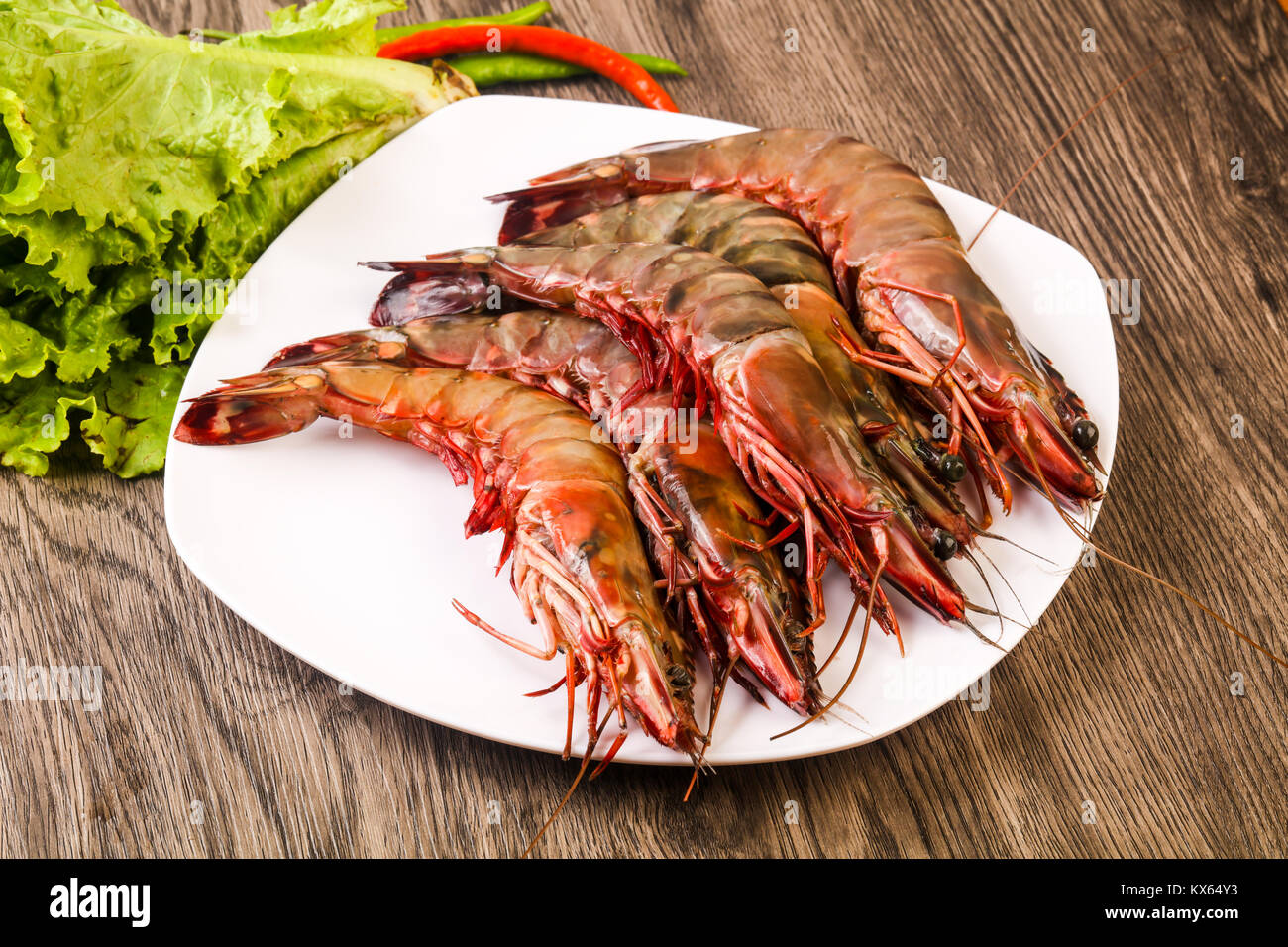 Raw big tiger prawn - ready for cooking Stock Photo - Alamy
