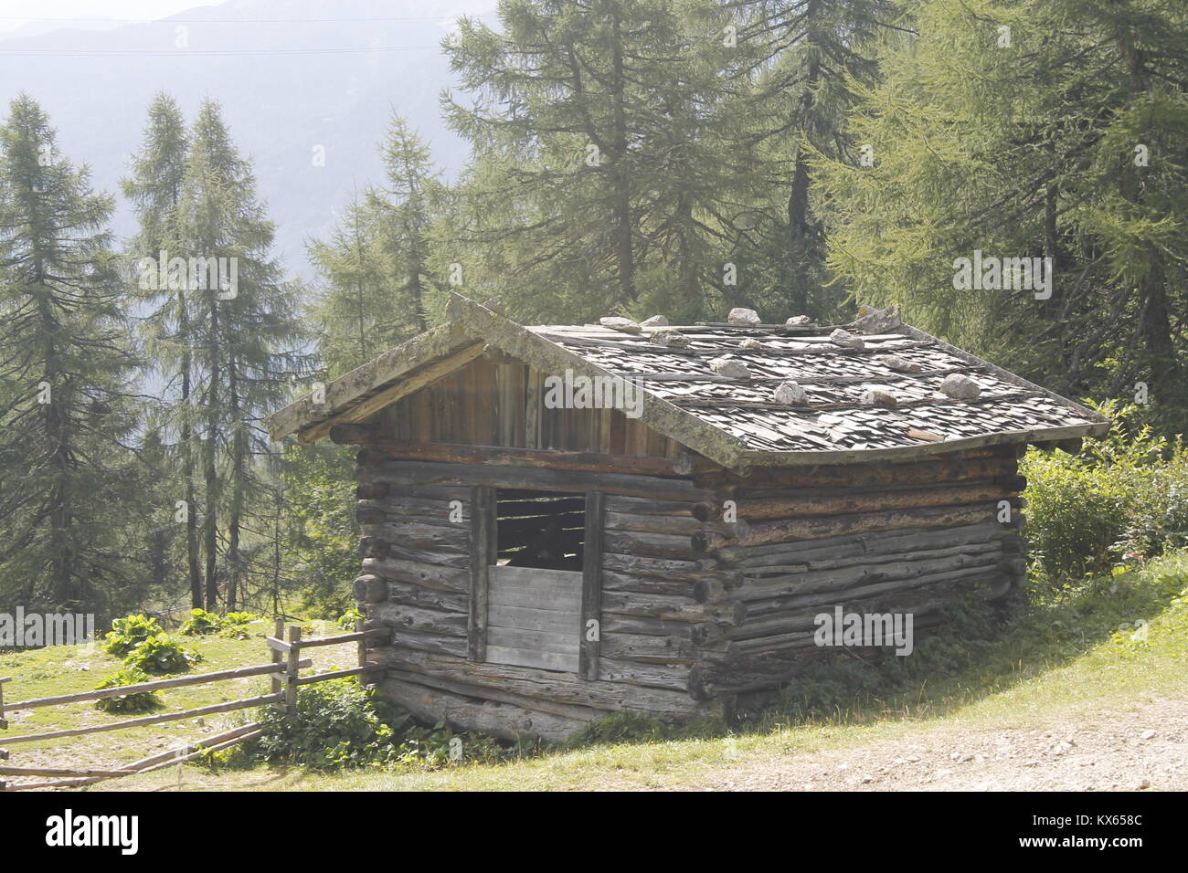 typical mountain huts on the Alps in Italy Stock Photo - Alamy
