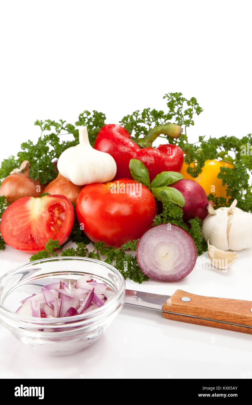 different vegetables on the kitchen table, isolated on white background ...