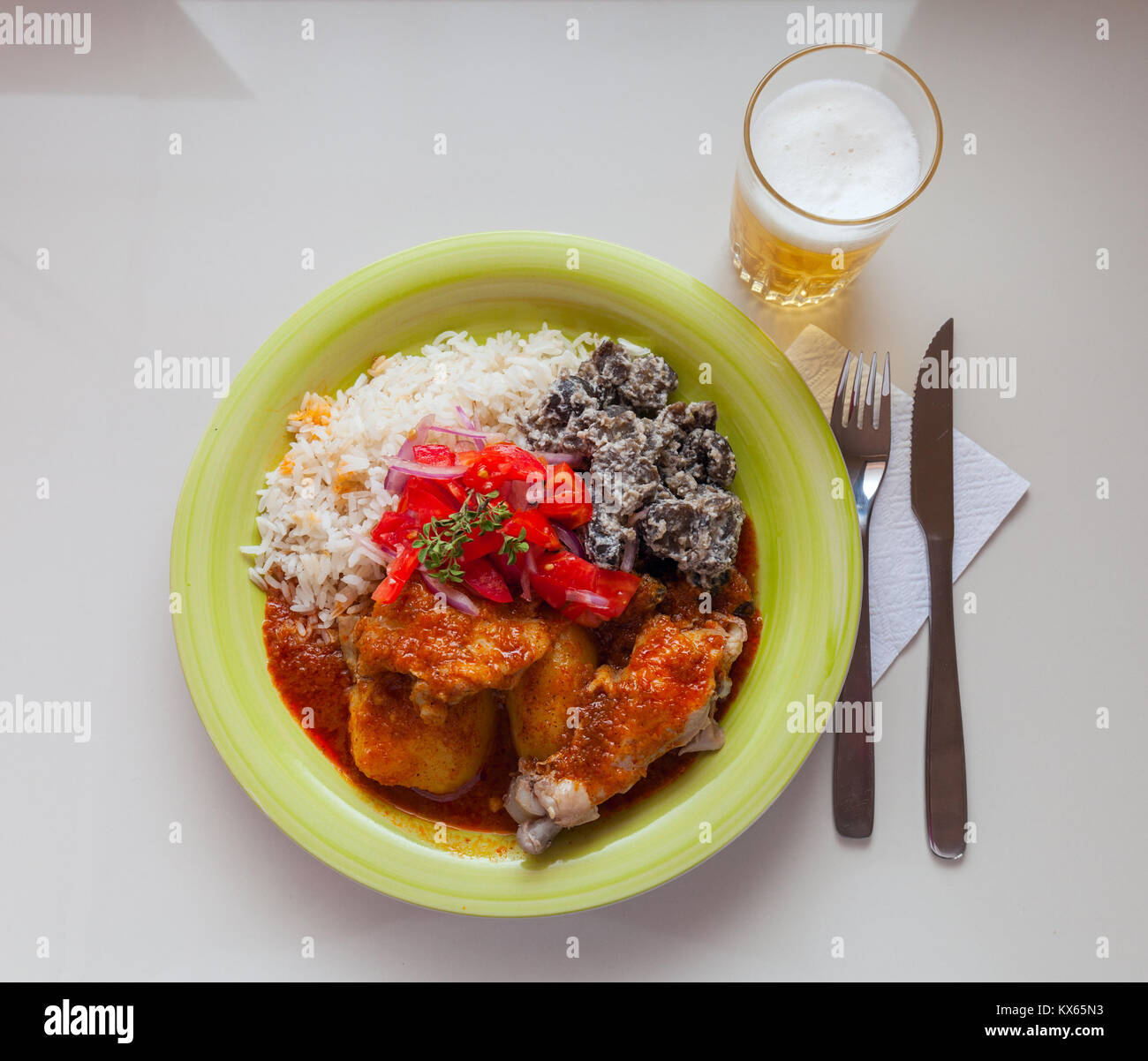 Typical Bolivian food. stewed chicken stuffed with spicy sauce served ...