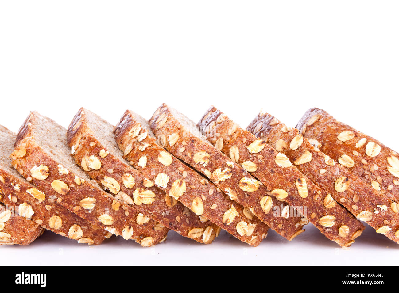 slices of bran bread, isolated on white background Stock Photo - Alamy