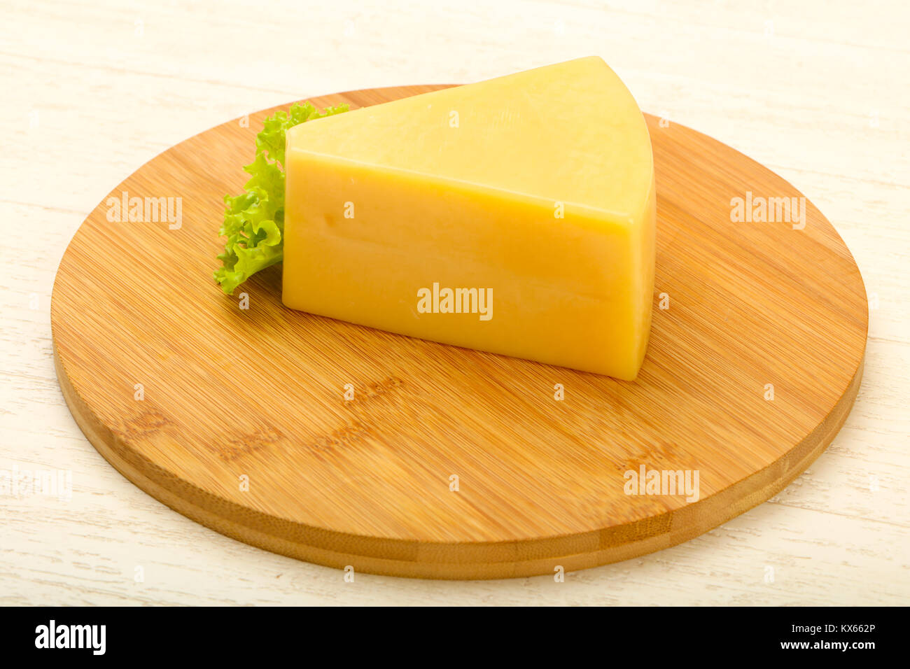 Parmesan cheese triangle Stock Photo - Alamy