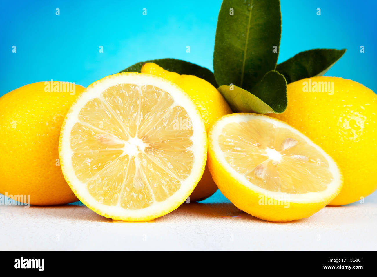 fresh lemons with leaves Stock Photo - Alamy