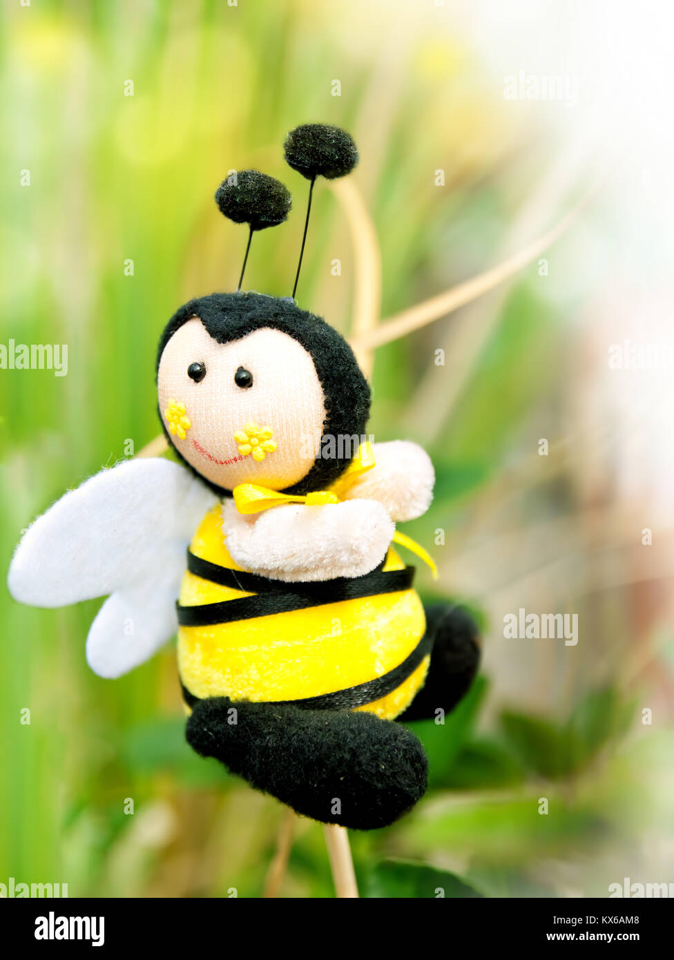 bee toy as decoration for flowerpot Stock Photo - Alamy