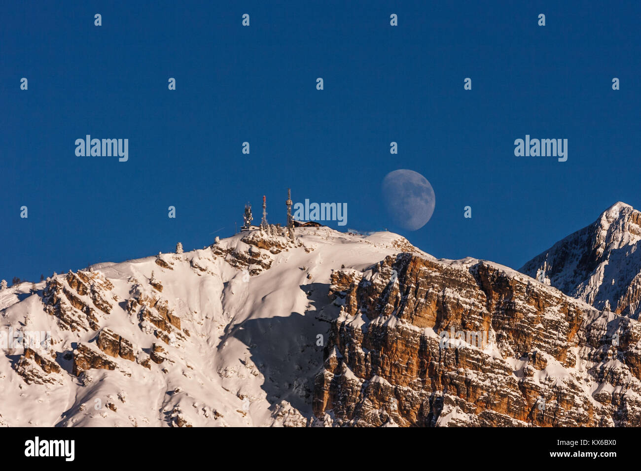 Scenic picture of a big full moon over the Faloria mountain, Cortina D ...