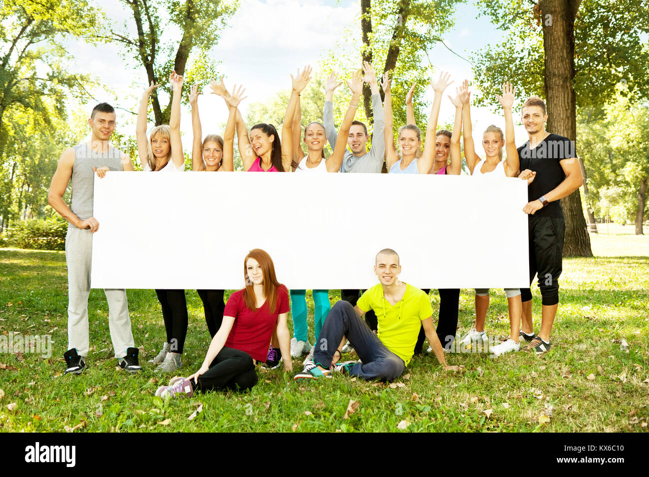 large group of students display placard, outdoor Stock Photo - Alamy