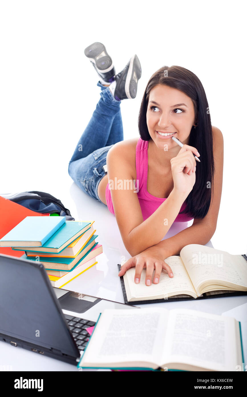 beautiful young girl learning for exam on floor, comfortably learning ...