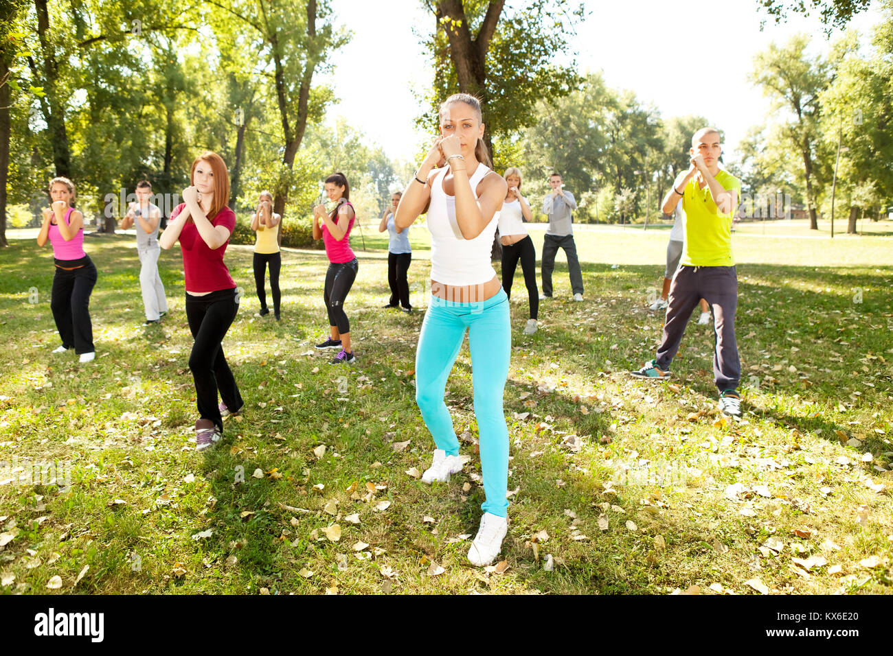 group of young people having kick boxing training , outdoor Stock Photo ...