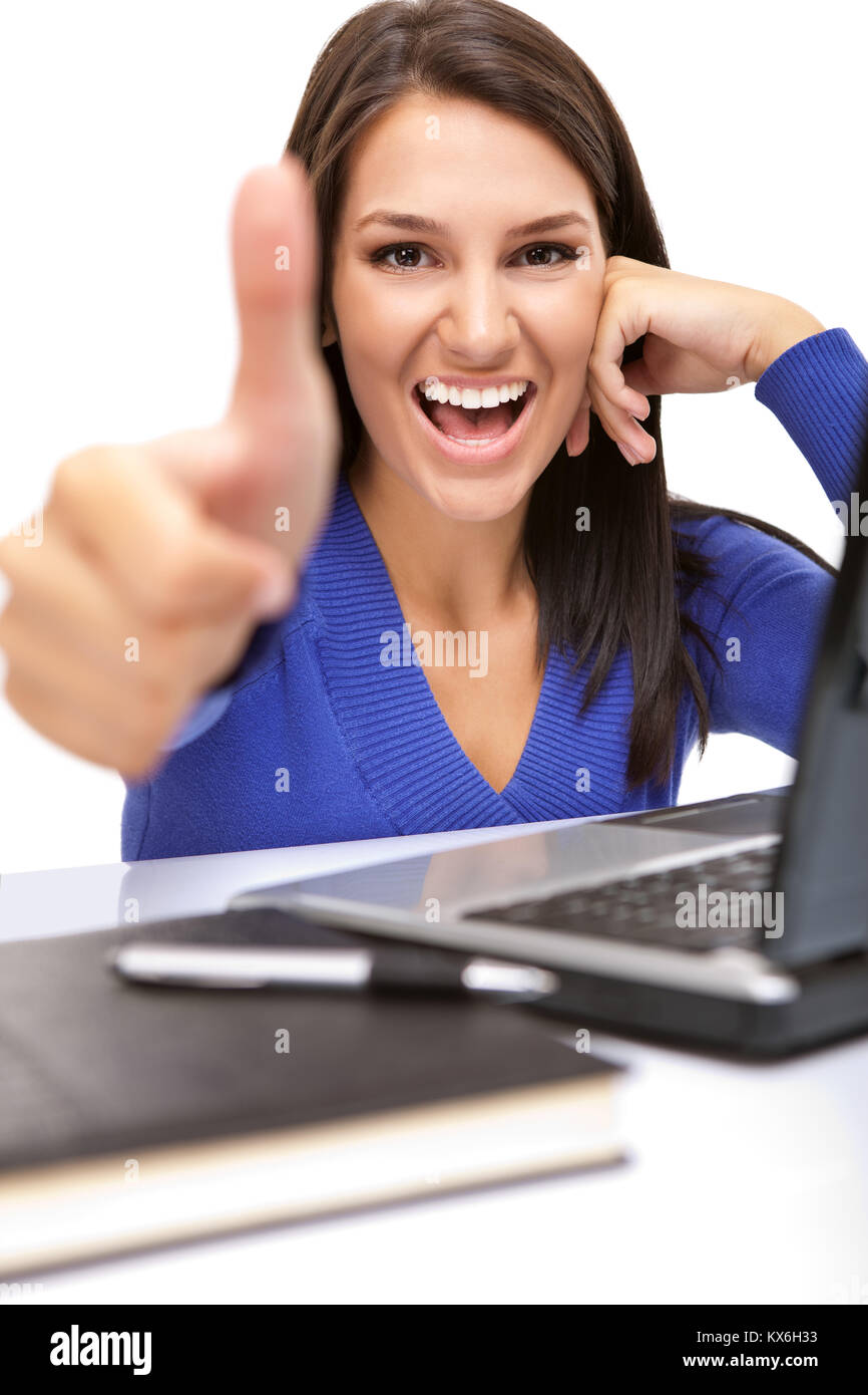 Beautiful young female student with thumb up, success in learning ...