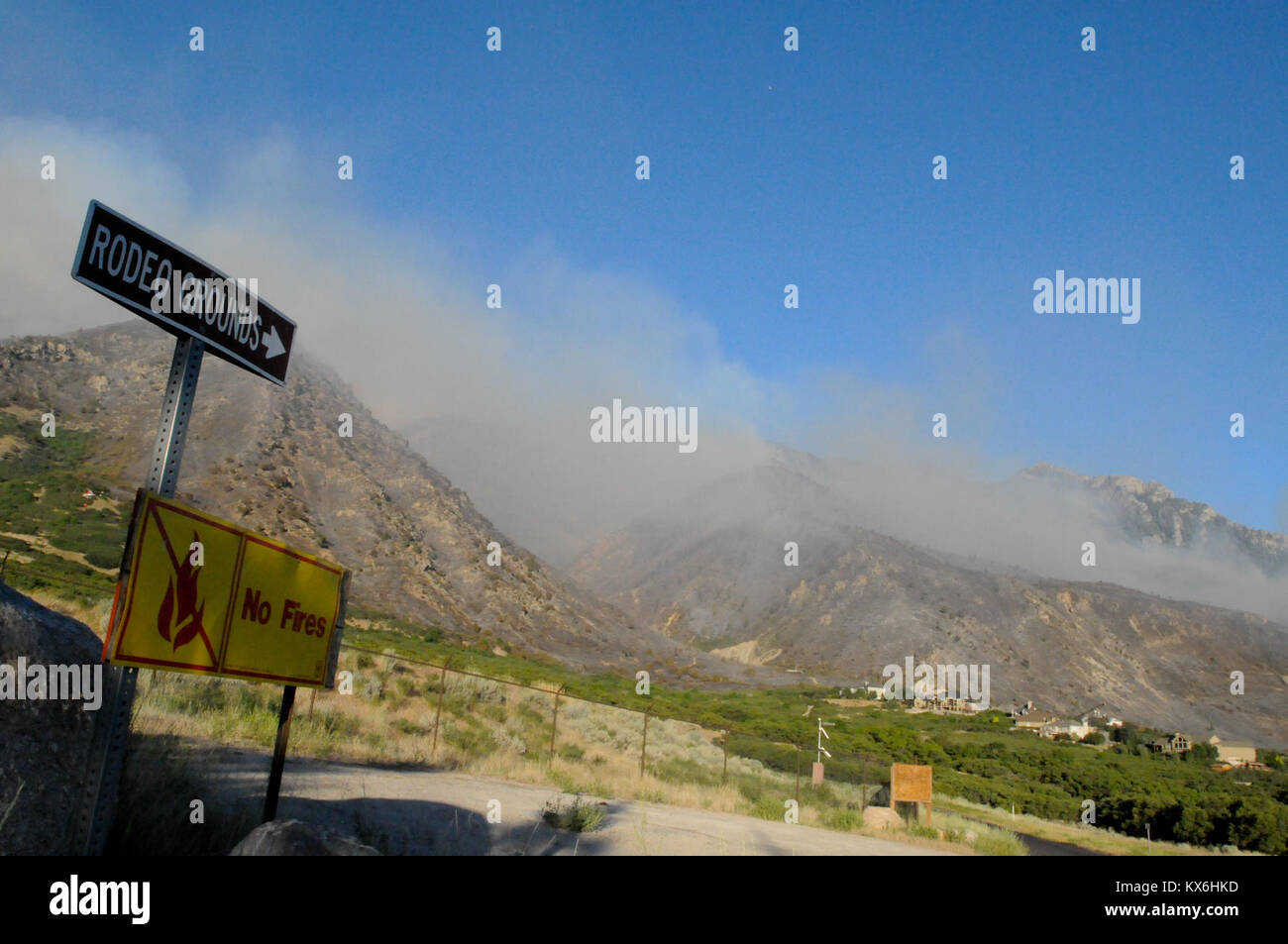 A fire burns above Alpine, Utah, July 3. Blackhawk helicopters from the ...