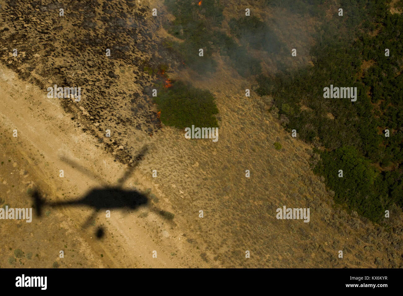 Perform water drops over a wildland on camp williams hi-res stock ...