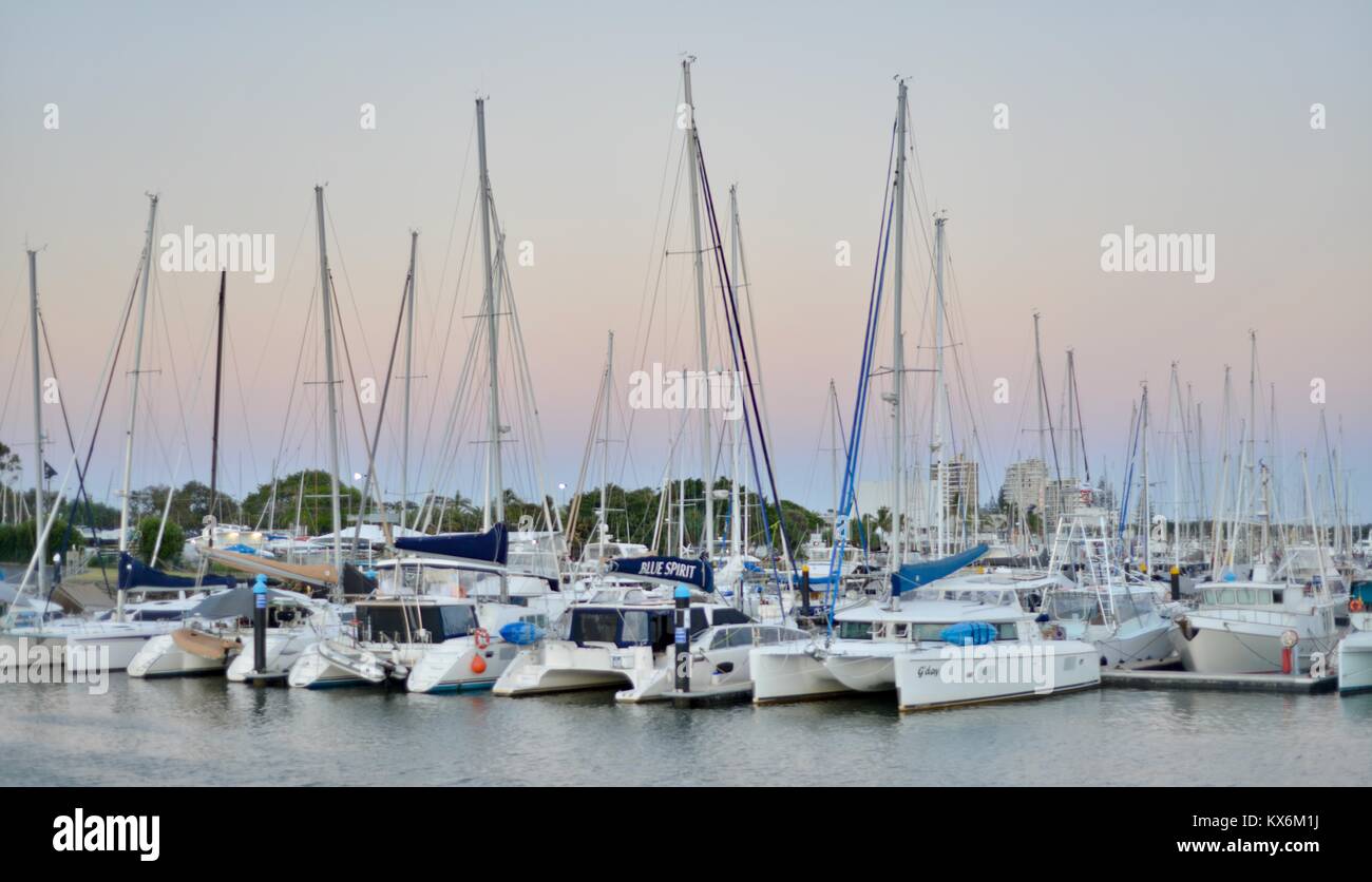 Rows of yachts at sunset on the canals of Mooloolaba, Sunshine Coast ...