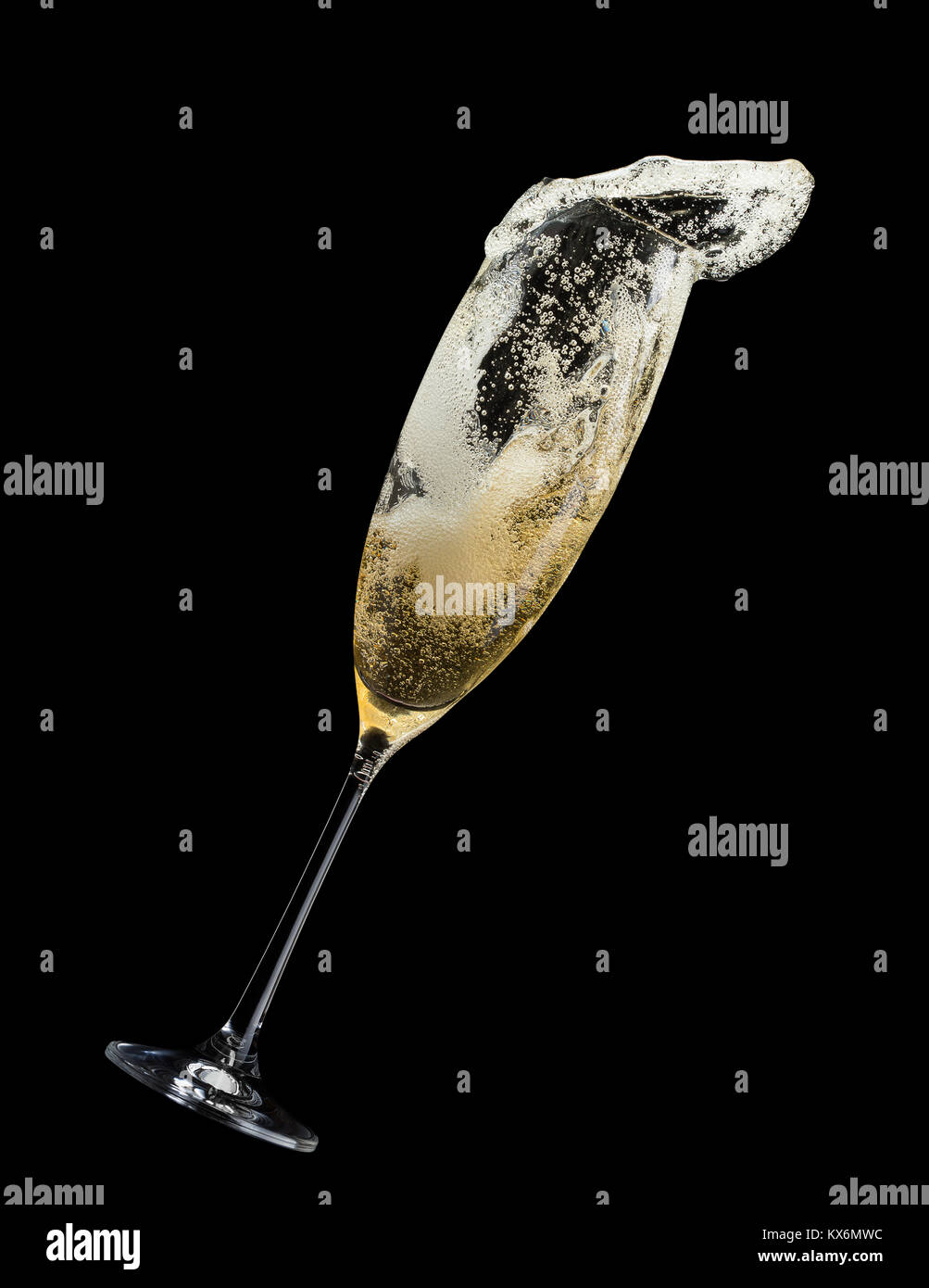 champagne splash from glass on a black background Stock Photo - Alamy