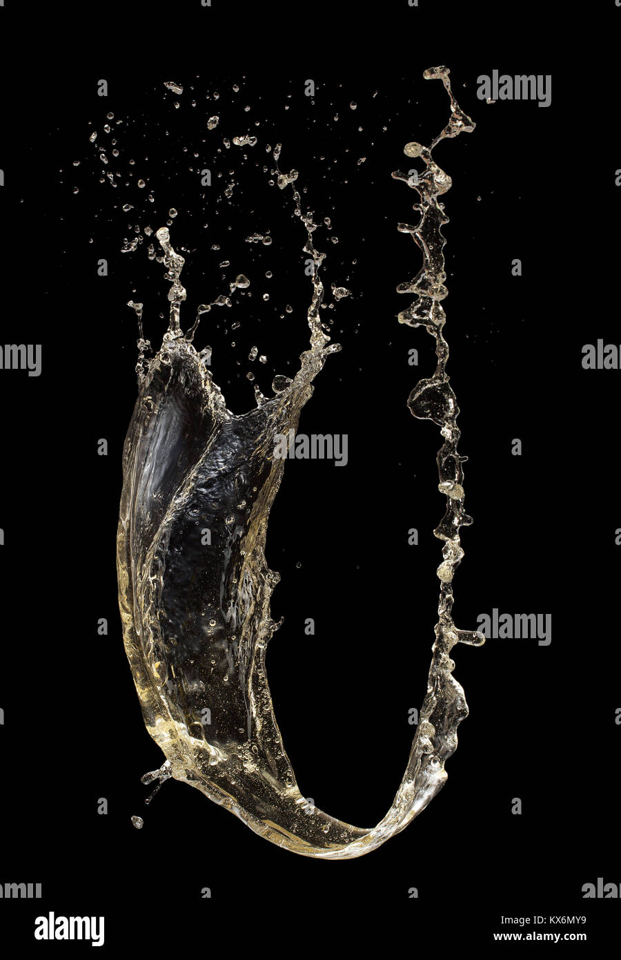 champagne splash on a black background Stock Photo - Alamy