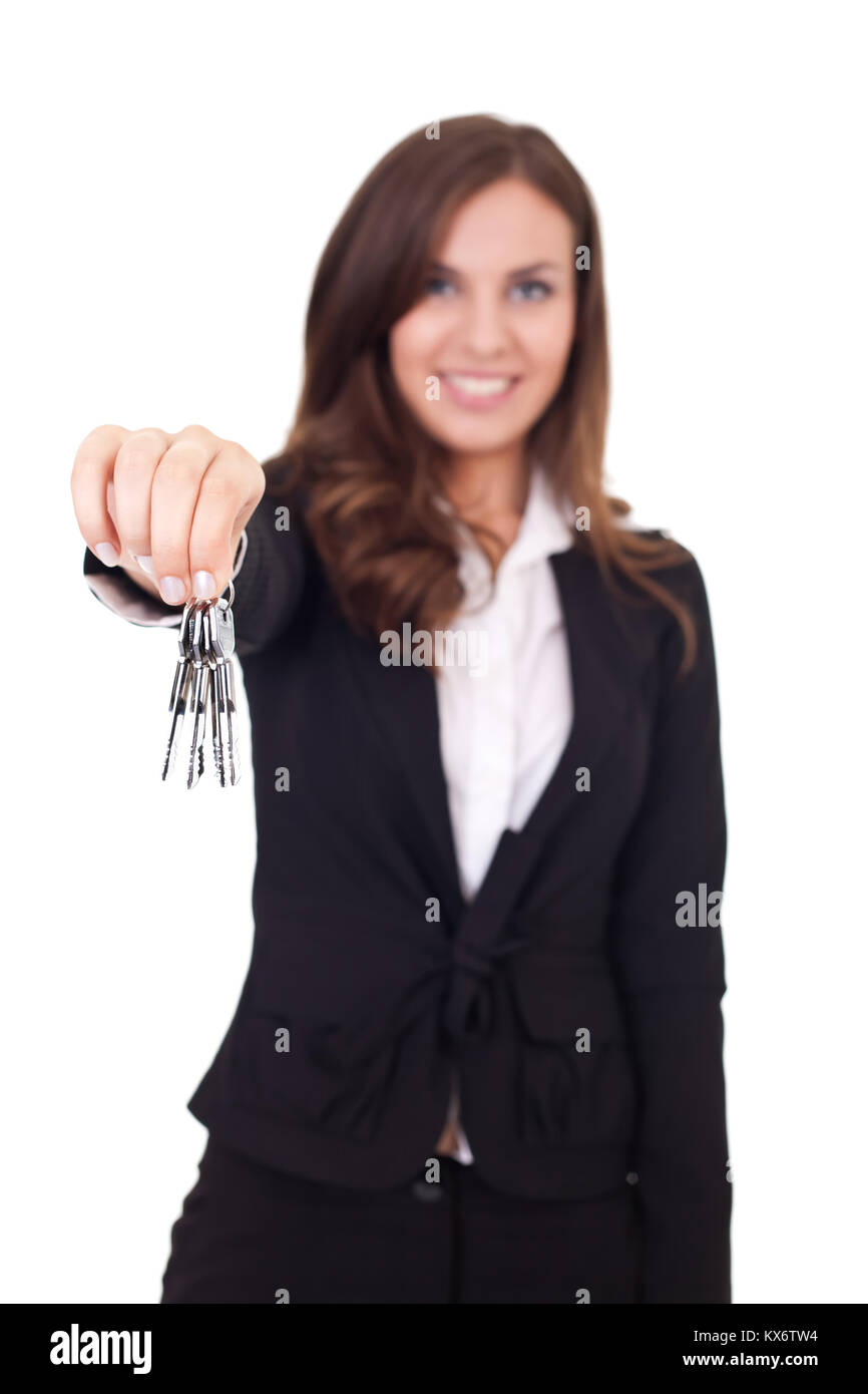 female real estate agent giving a home buyer the keys, isolated on ...