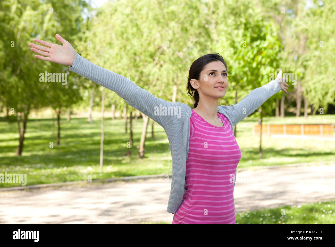 young pretty girl stretching outside Stock Photo - Alamy