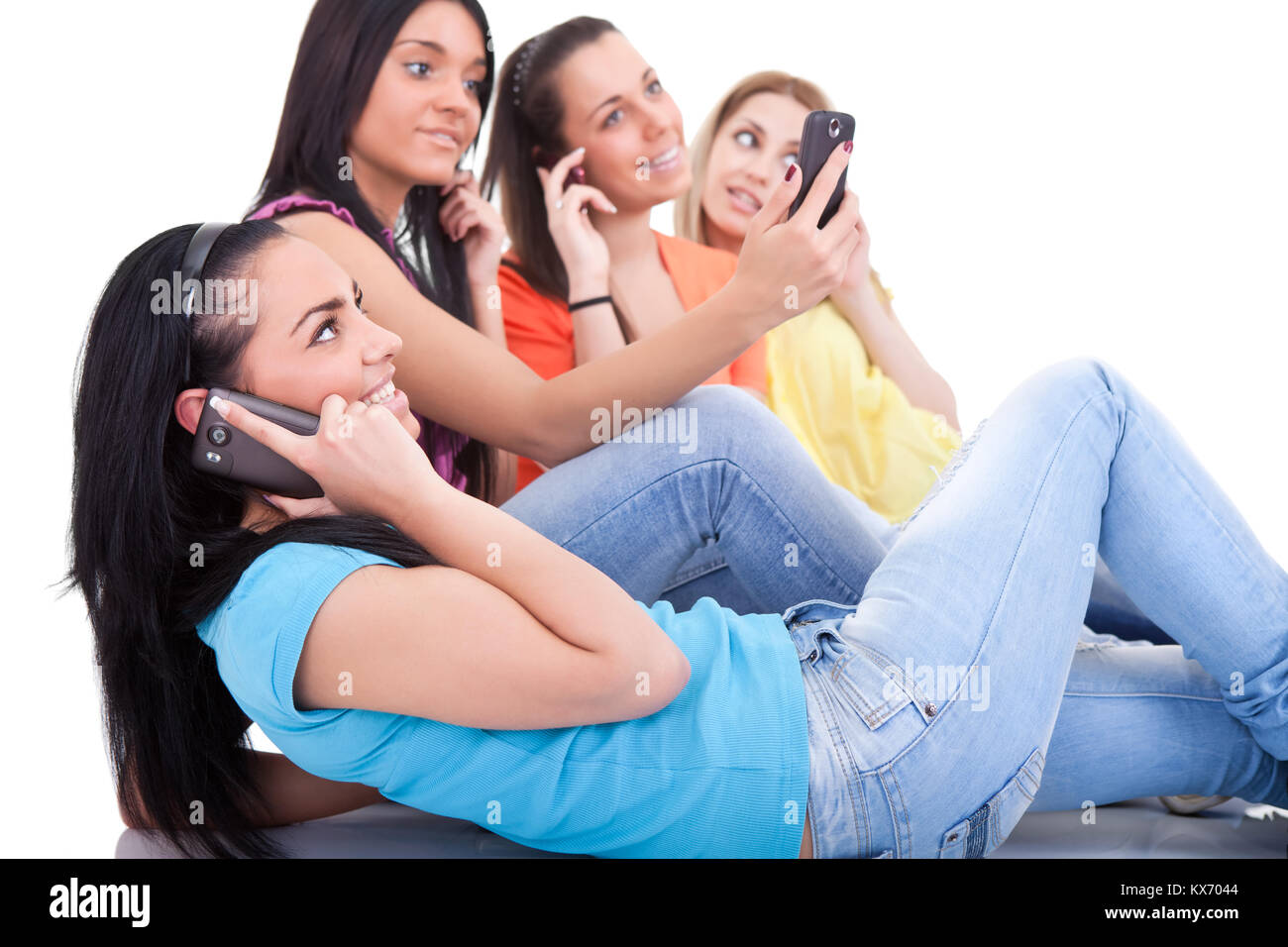 young teenagers using cell phones, isolated white background Stock ... young teenagers using cell phones, isolated white background Stock ...