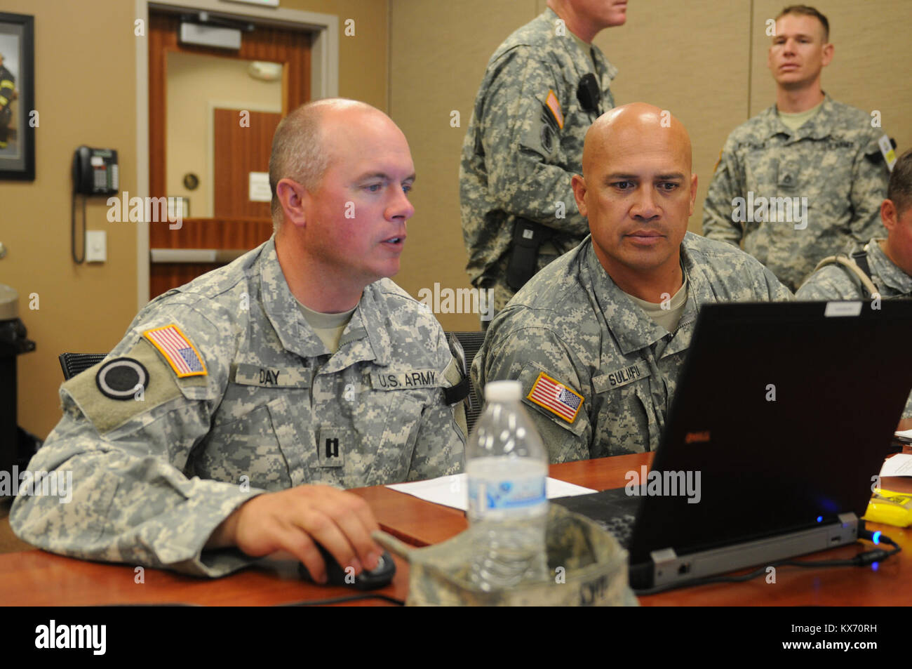 DENVER -- Capt. Shane D. Day and First Sgt. Sione F. Suliafu, both ...
