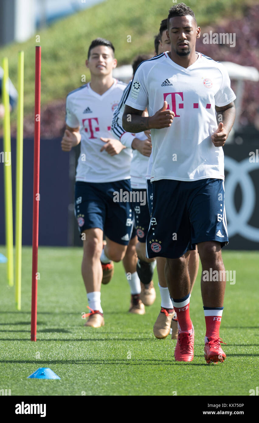FC Bayern Munich's James Rodriguez (L) and Jerome Boateng participate ...