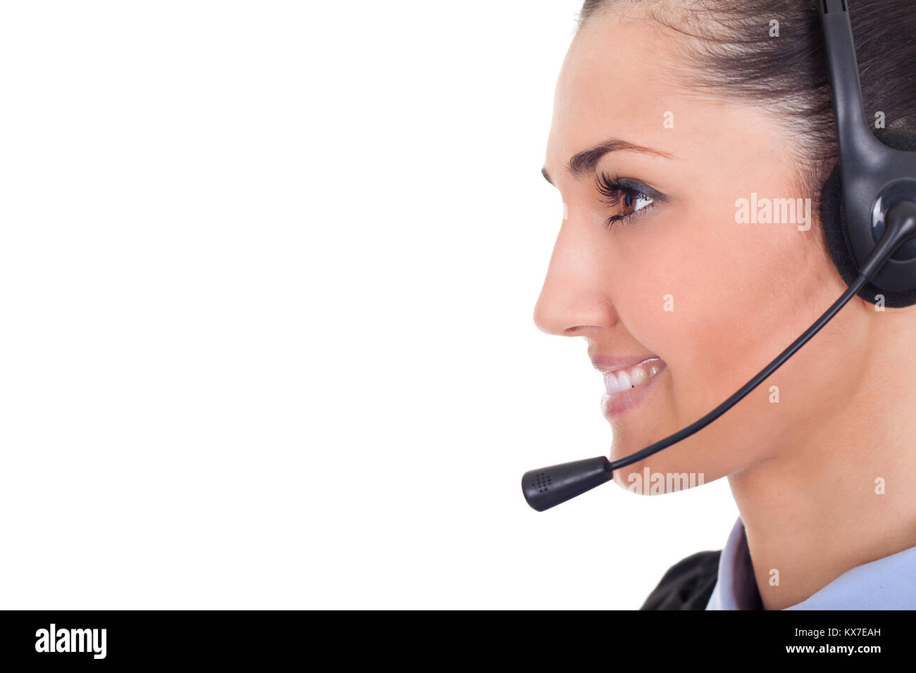 young call center employee wearing headset, close up, on white ...