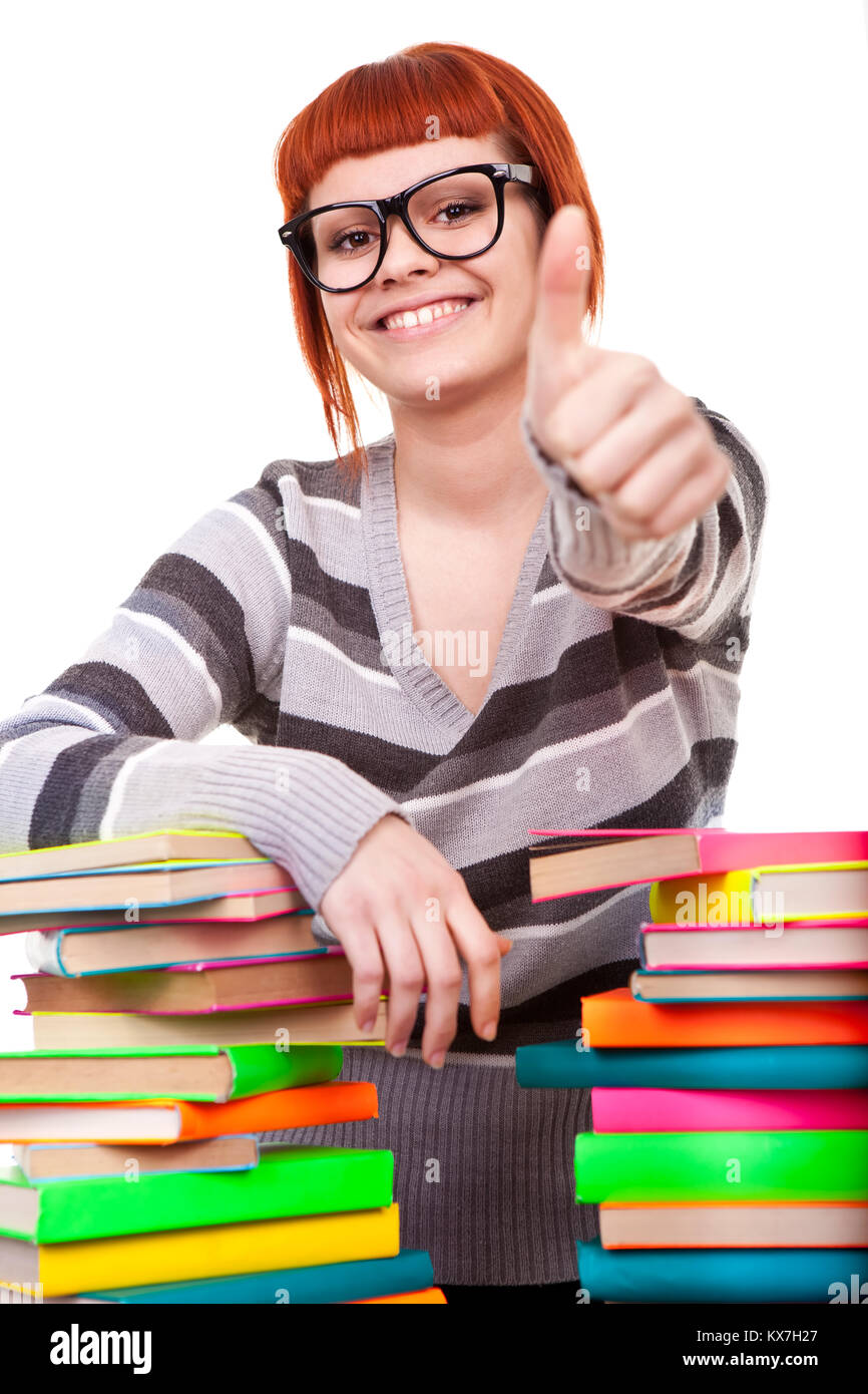 girl with pile book showing thumb up, isolated on white background ...