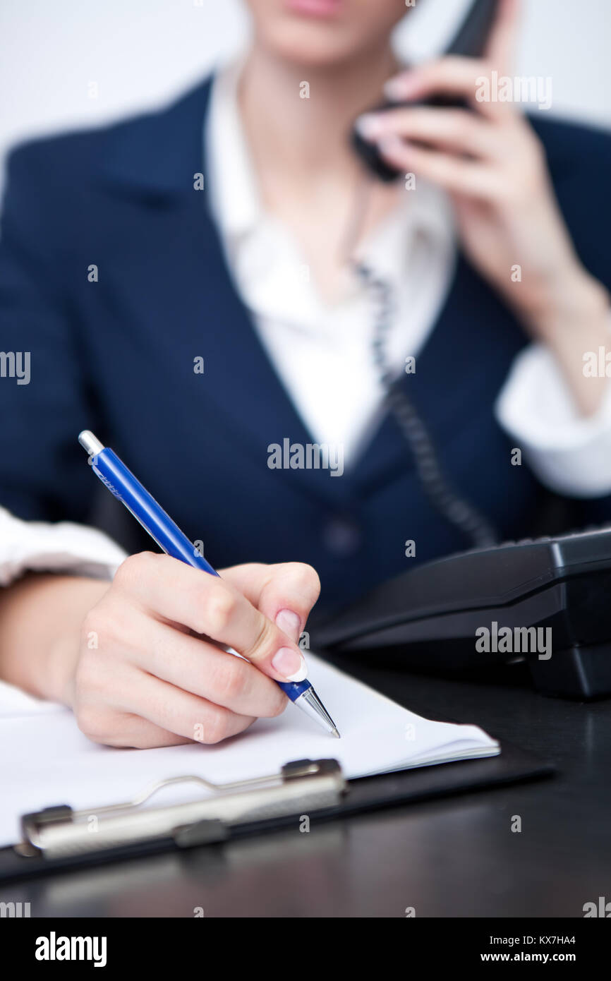 woman's hand making note, close up Stock Photo - Alamy
