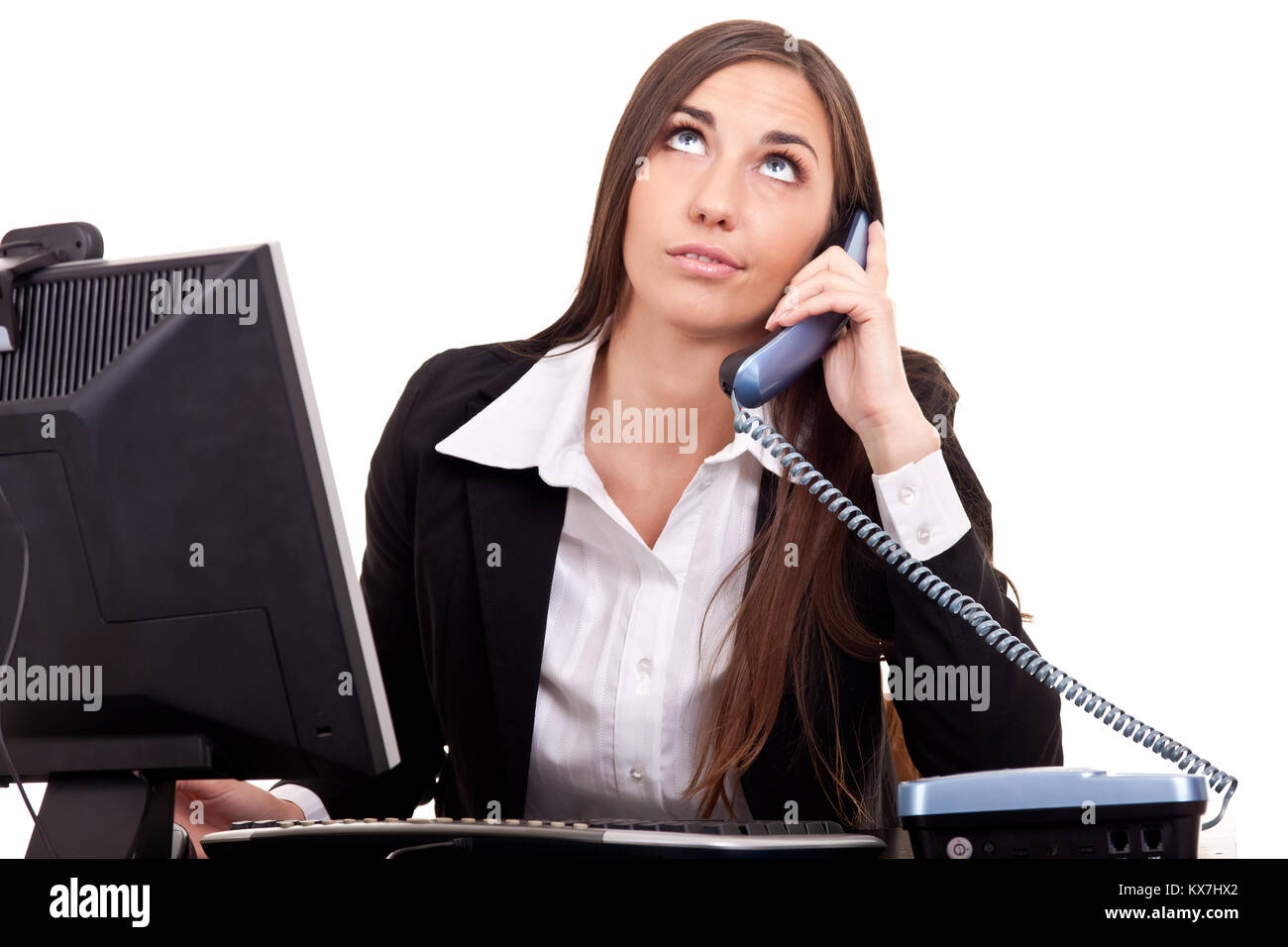 business woman talking with boring client on phone and working on ...