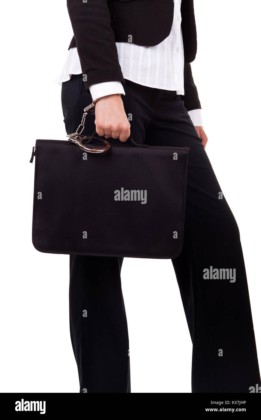 females hand with handcuff and a suitcase, isolated on white Stock ...