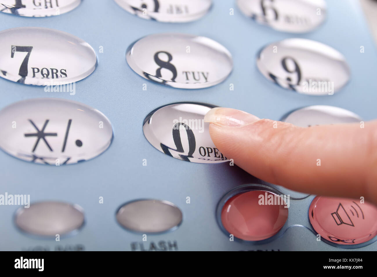 females finger pressing zero on blue phone Stock Photo - Alamy