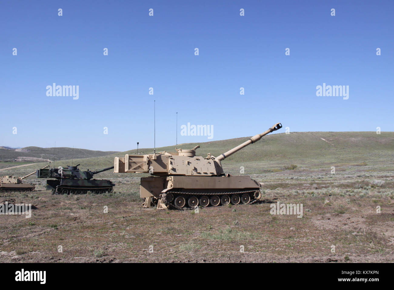 U.S. Army combat training in the desert. Self propelled Paladin ...