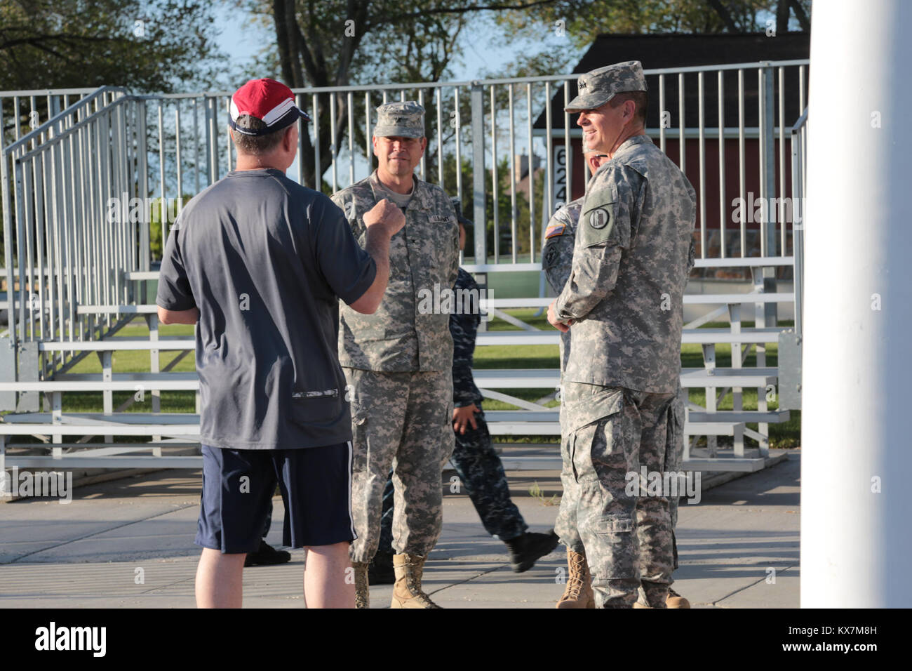 Military members and civilians participate in the Camp Williams ...