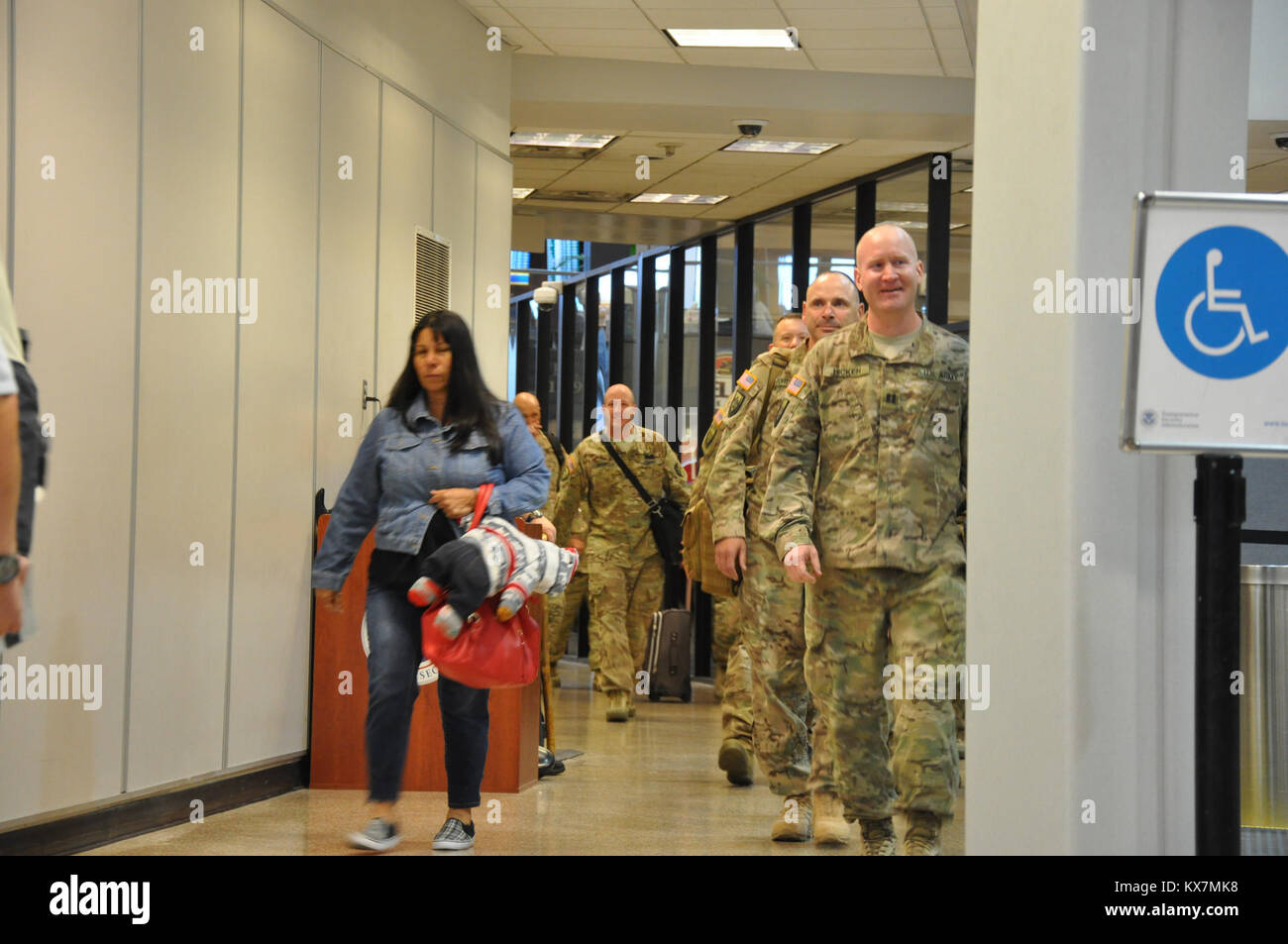 Eighteen members of the 65th Field Artillery Brigade returned from a 12 ...