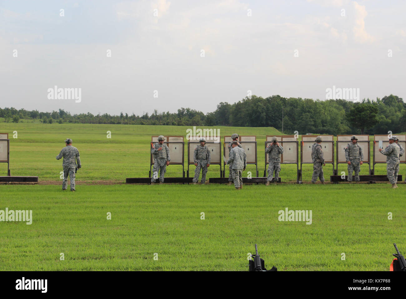 US Army National Guard military training in the field. Practicing ...