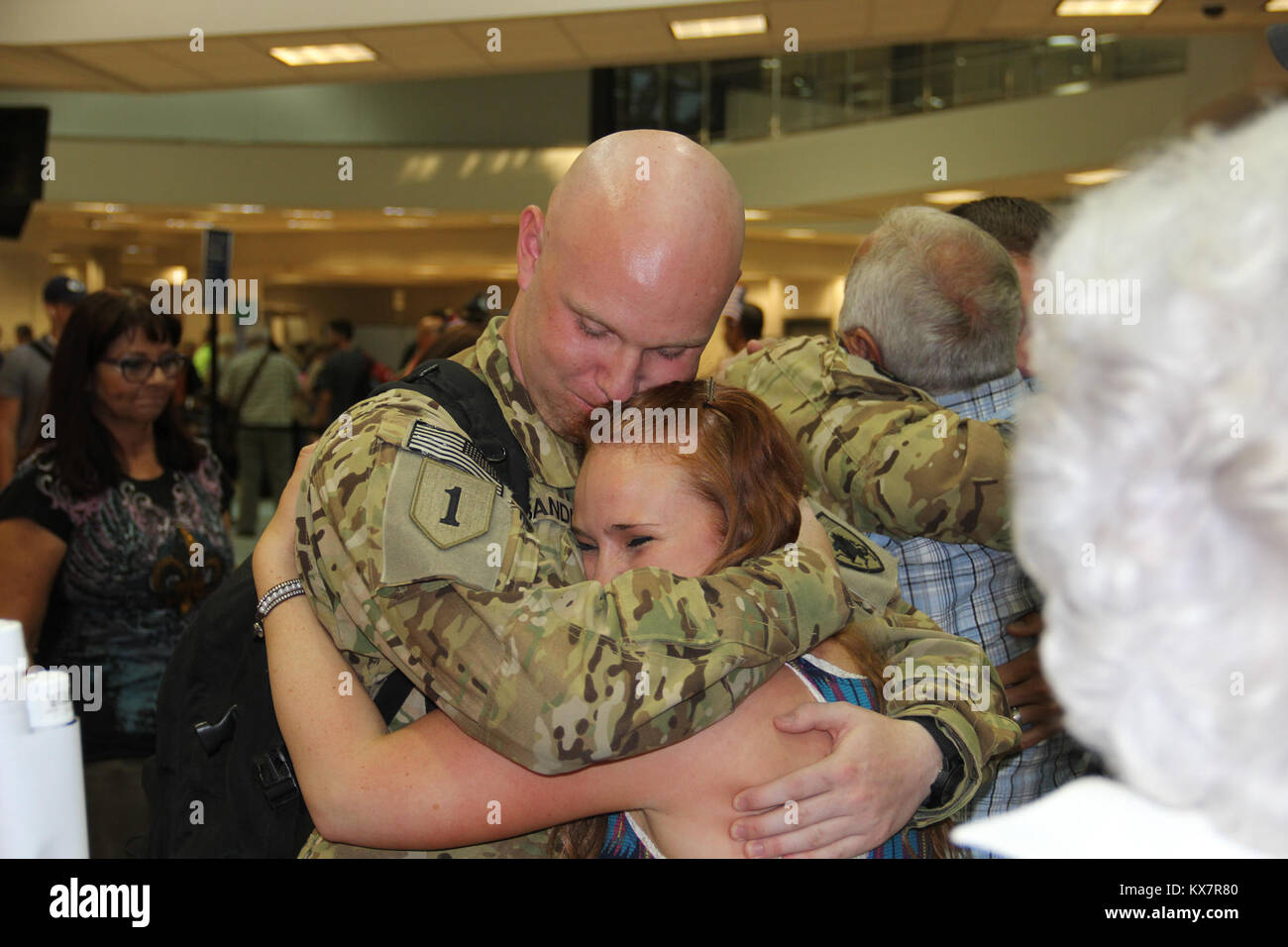 US Army National Guard welcome home from family and friends after ...