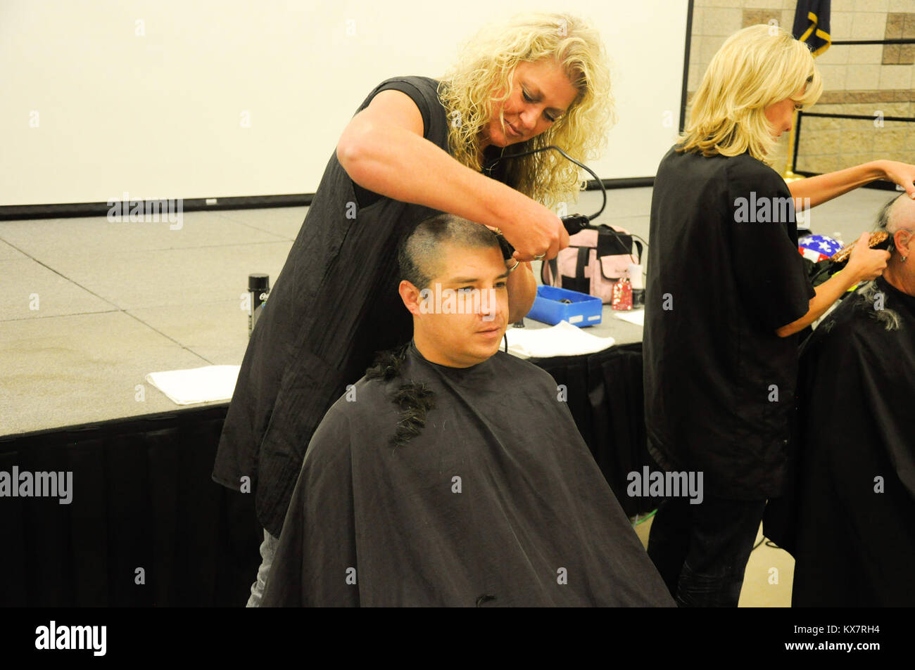 U.S. Army National Guard sponsored head shave for good causes Stock ...