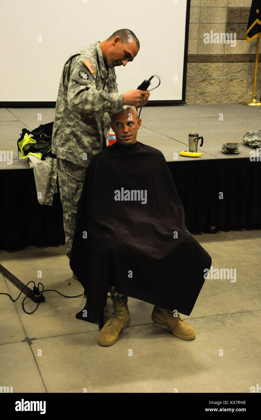 U.S. Army National Guard sponsored head shave for good causes Stock ...