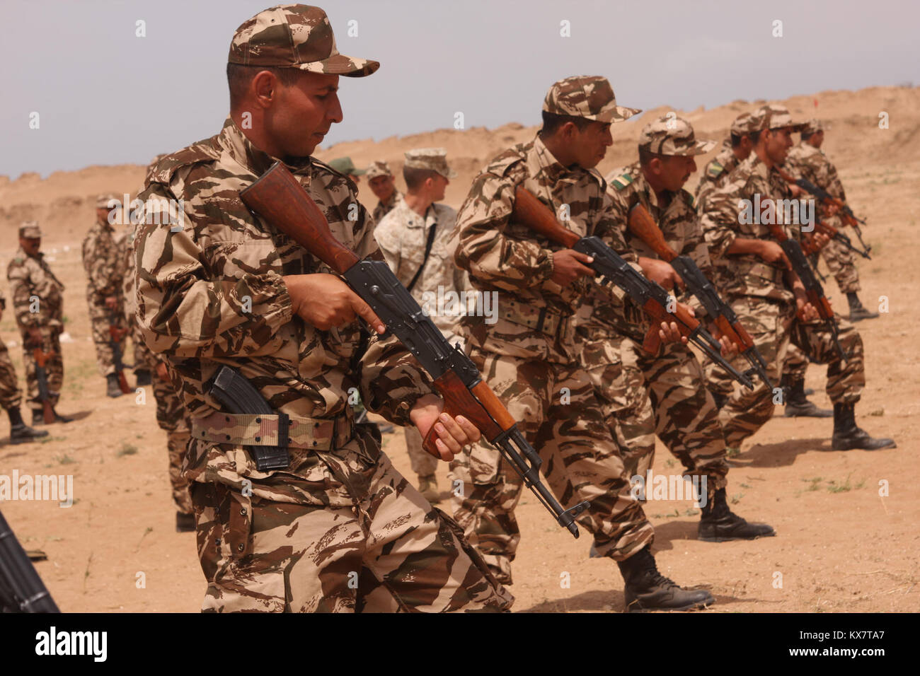 US Army military weapons training in the desert. Passing skills on to ...
