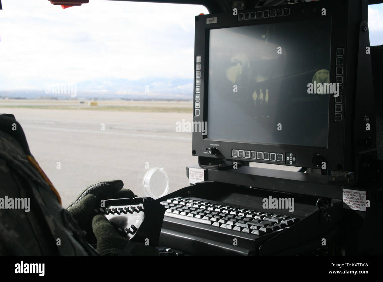 U.S. Army National Guard helicopter onboard with computer screen data ...