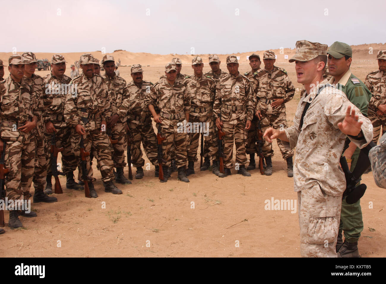 US Army military weapons training in the desert. Passing skills on to ...