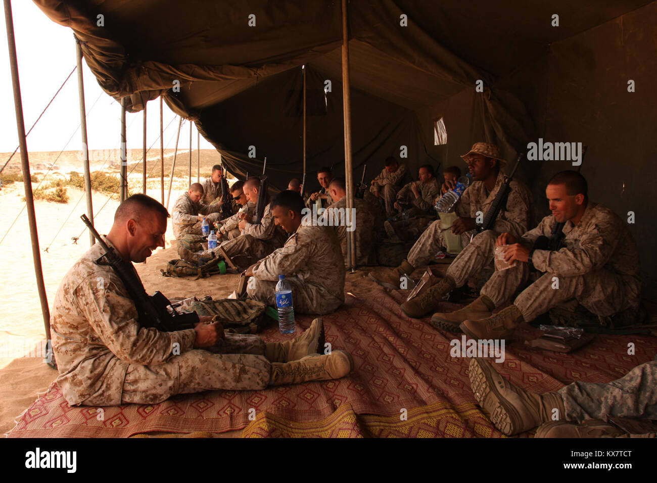 US Army military weapons training in the desert. Passing skills on to ...