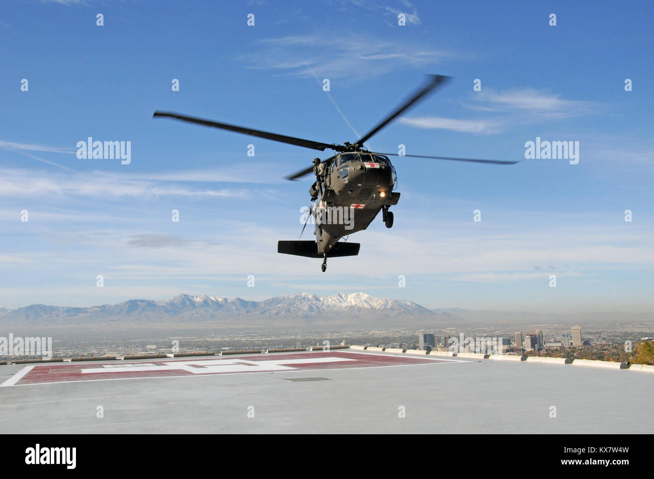 A Utah National Guard Blackhawk helicopter lands at the University of ...