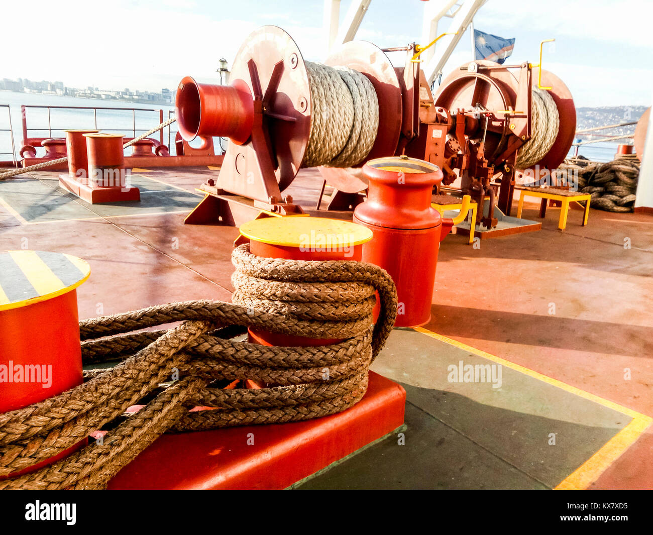 Mooring bollard on the decks of an industrial seaport Stock Photo - Alamy
