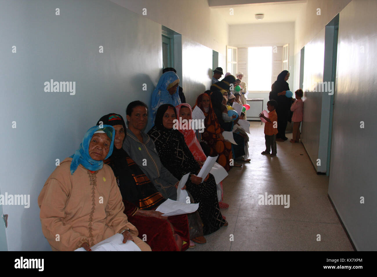 US Army National Guard medics. Doctor helping poor people Stock Photo ...