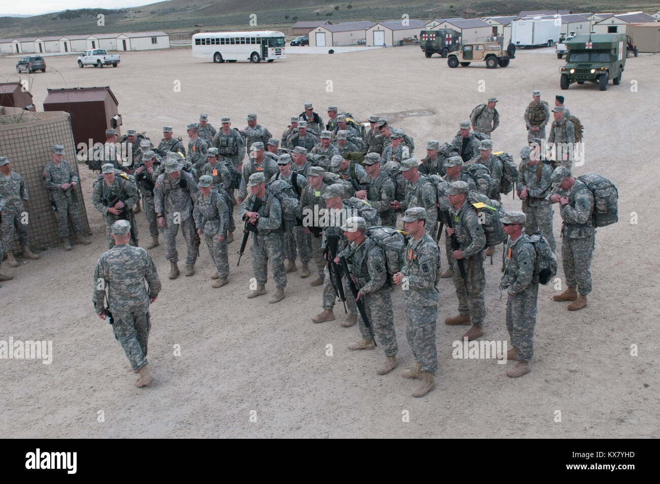 Soldiers participating in the Best Warrior Competition perform a ruck ...