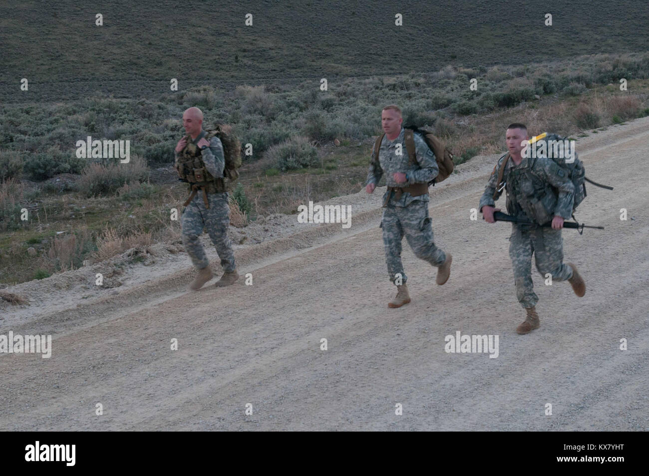 Soldiers participating in the Best Warrior Competition perform a ruck ...