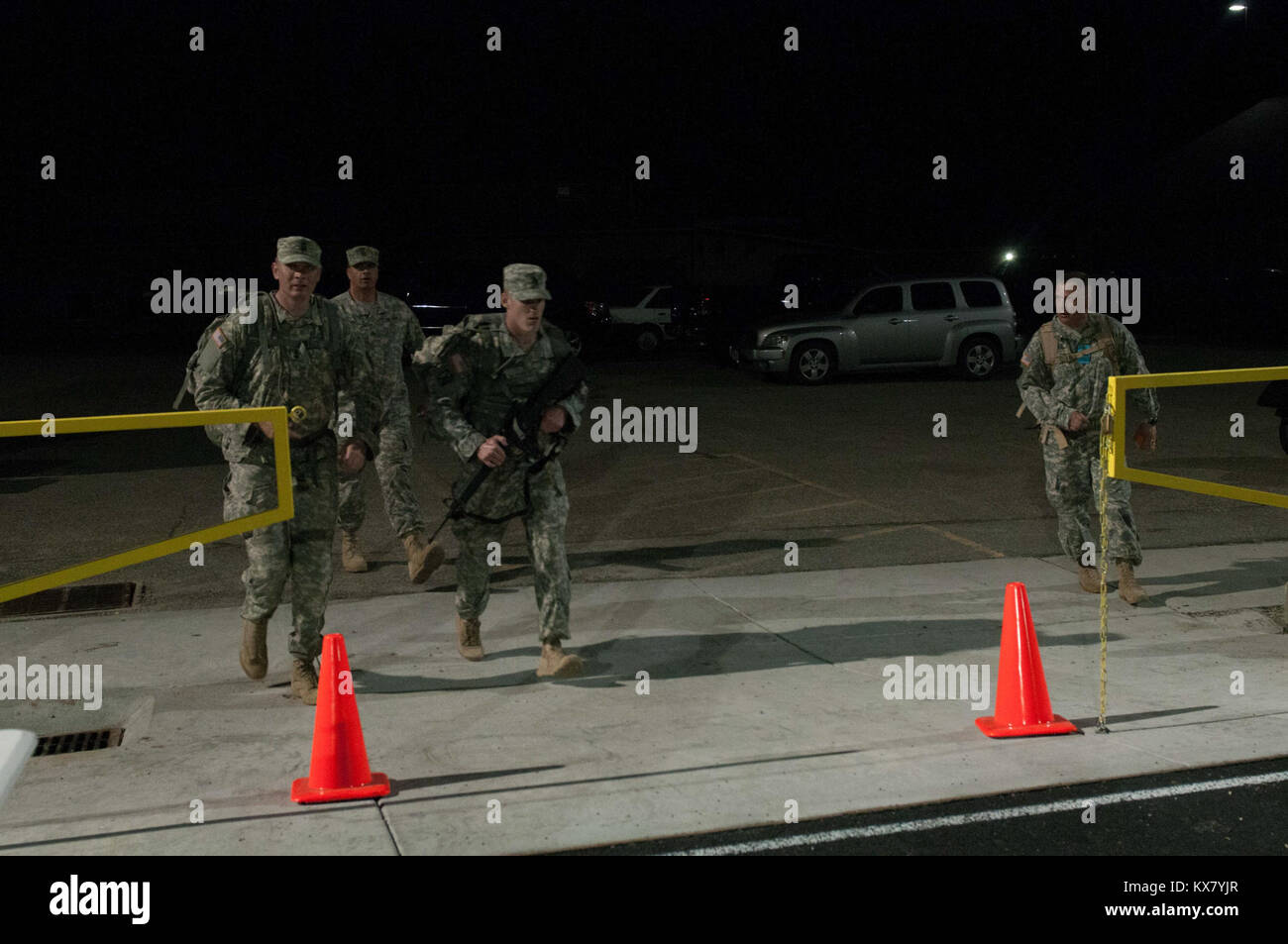 Soldiers participating in the Best Warrior Competition perform a ruck ...